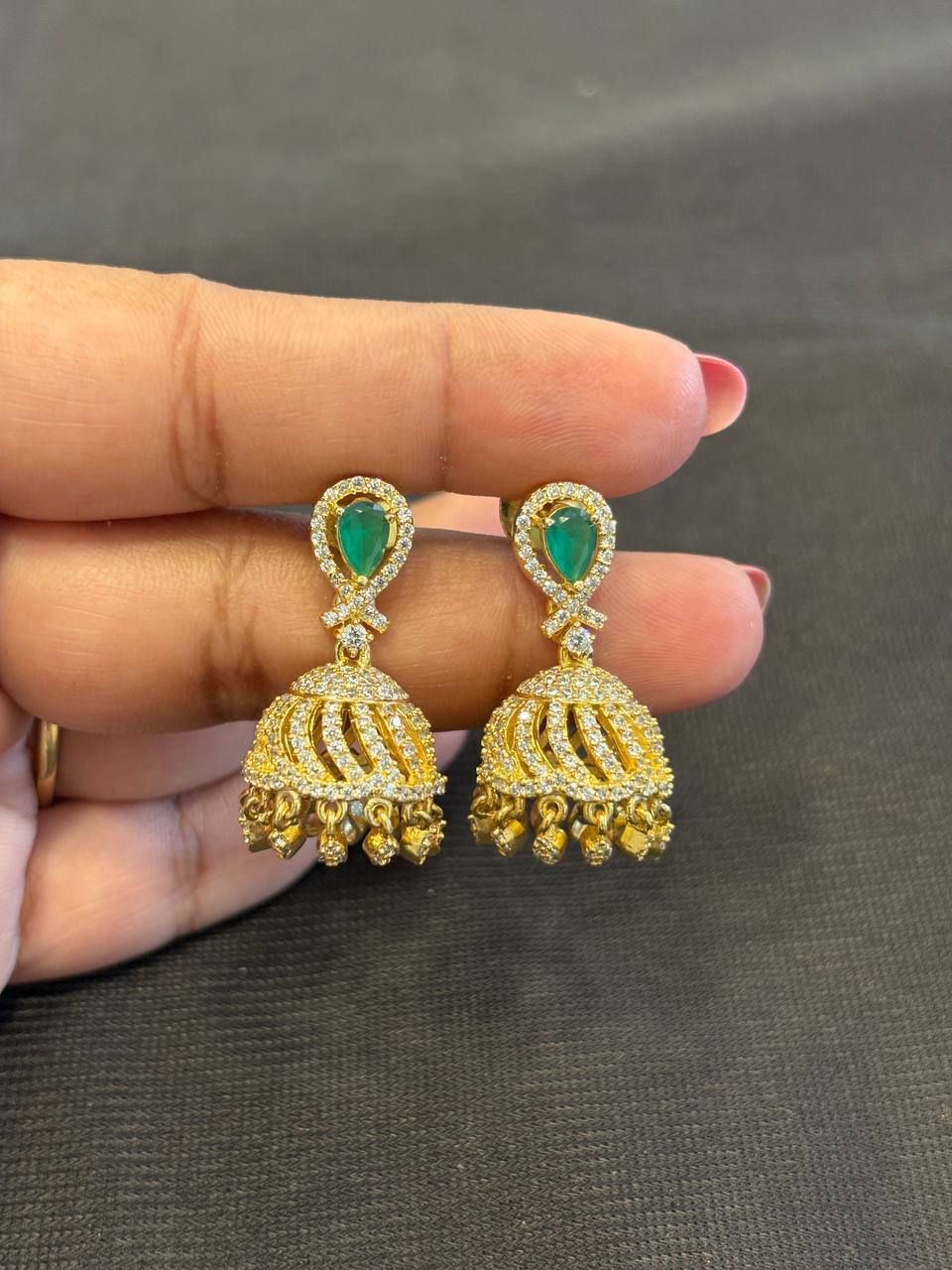 Silver thoorigai green jimikki with gold finish